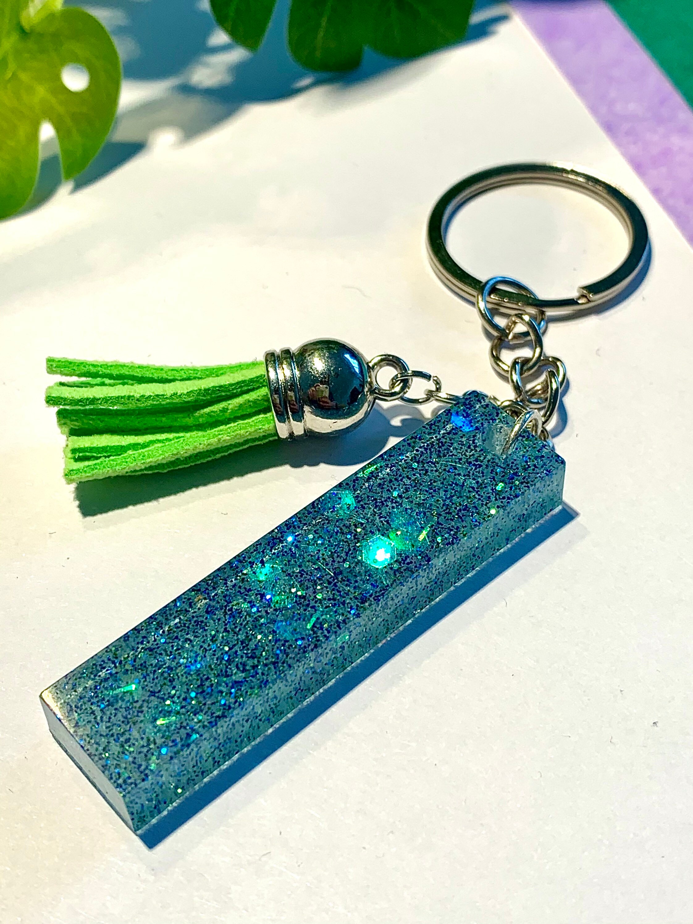 Resin keychain with green tassel | Etsy