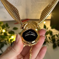 Proposal Snitch – Wizard Inspired Flying Ball Proposal Ring Holder ...