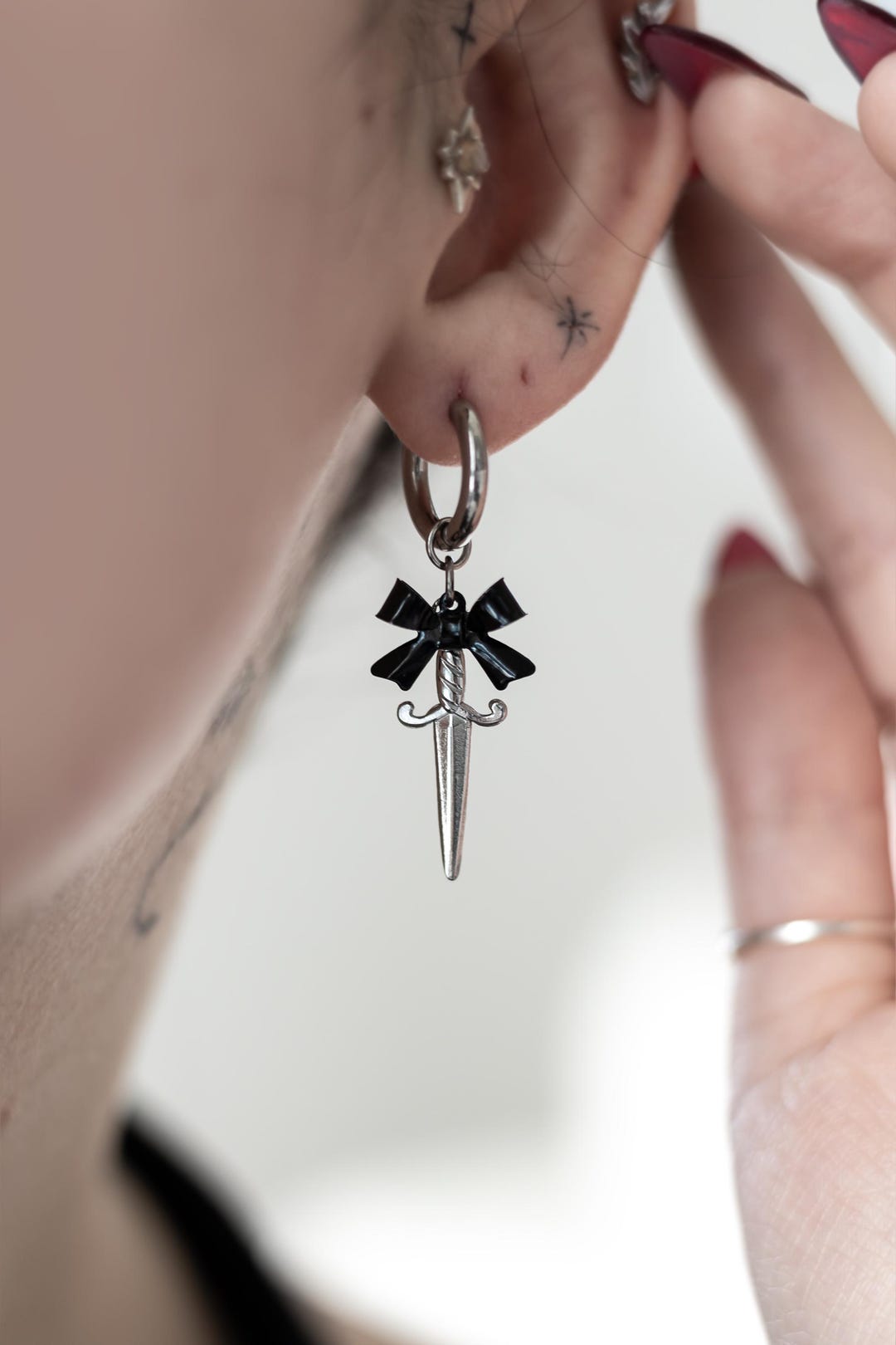 Rogue's Kiss Earrings | Dagger and Bow Earrings | Stainless Steel ...