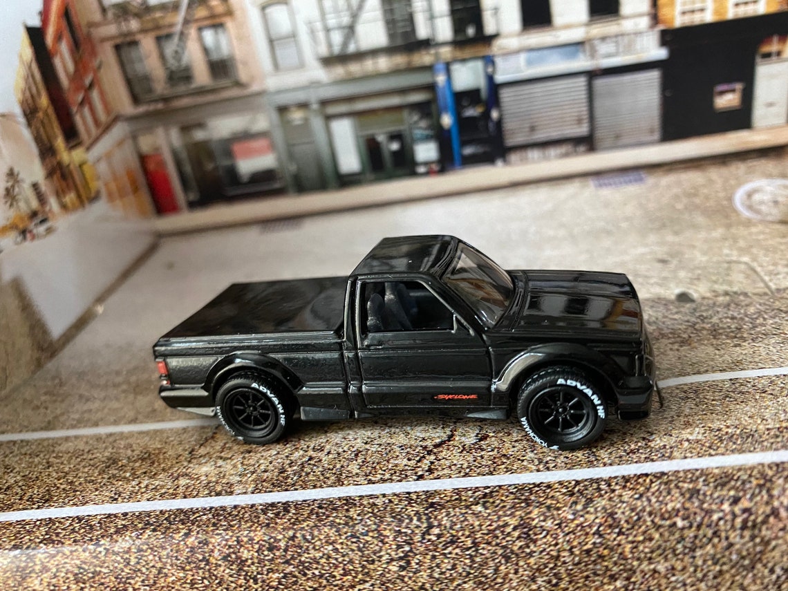 Hot wheels GMC Syclone 1/64 scale wheel swapped real riders | Etsy