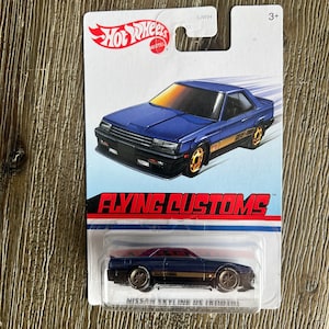 Hot Wheels Flying Customs Nissan Skyline RS Blue Target. With Real ...