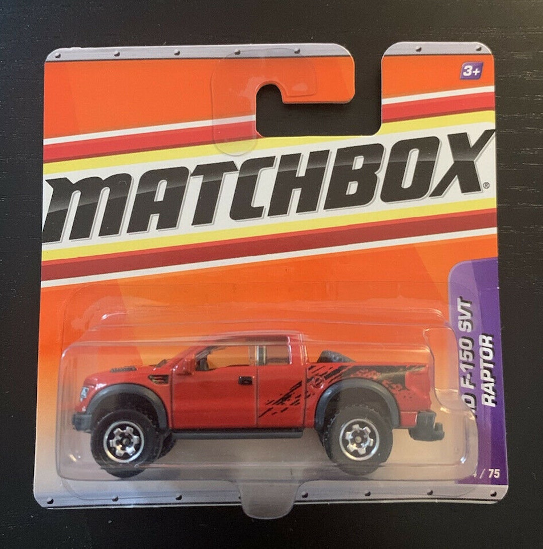 Matchbox 2010 Ford F-150 SVT Raptor-red With Wheel in the Back-2009 MBX ...