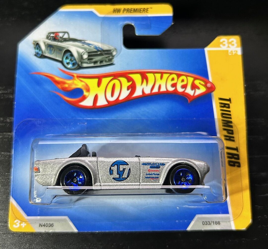 Hot Wheels Triumph Tr6-silver With Blue Wheels-2009 Short Card- Hard to ...