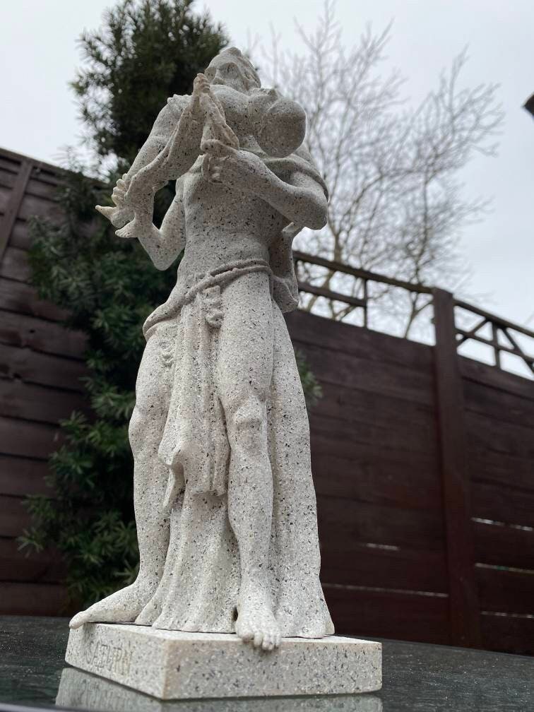 Saturn Statue