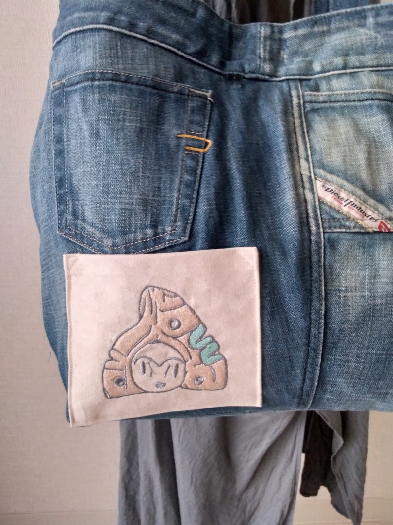 Light Blue Denim Upcycled Tote Bag. Ancient Japanese Jomon Face Handle ...