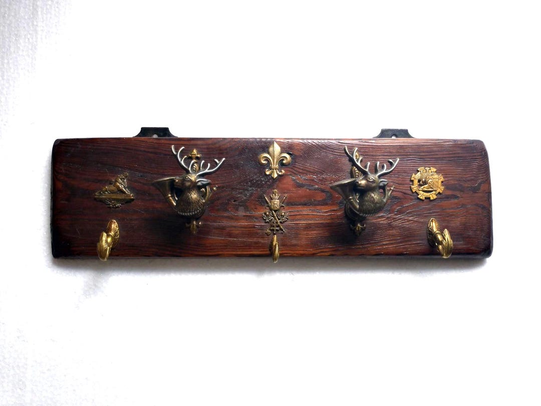 Vintage French Military Coat Rack With Brass Emblems and Stag Heads ...