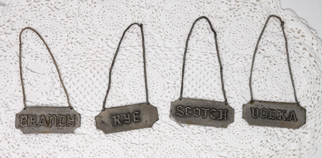 Selection of Decanter Tags/labels by Round Hill Pewter N.S. Canada ...