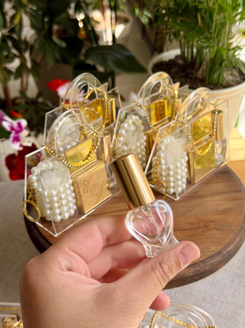 Pearl Bag Favors Box: Mini Pearl Bags, Madele Chocolates, Cologne or ...