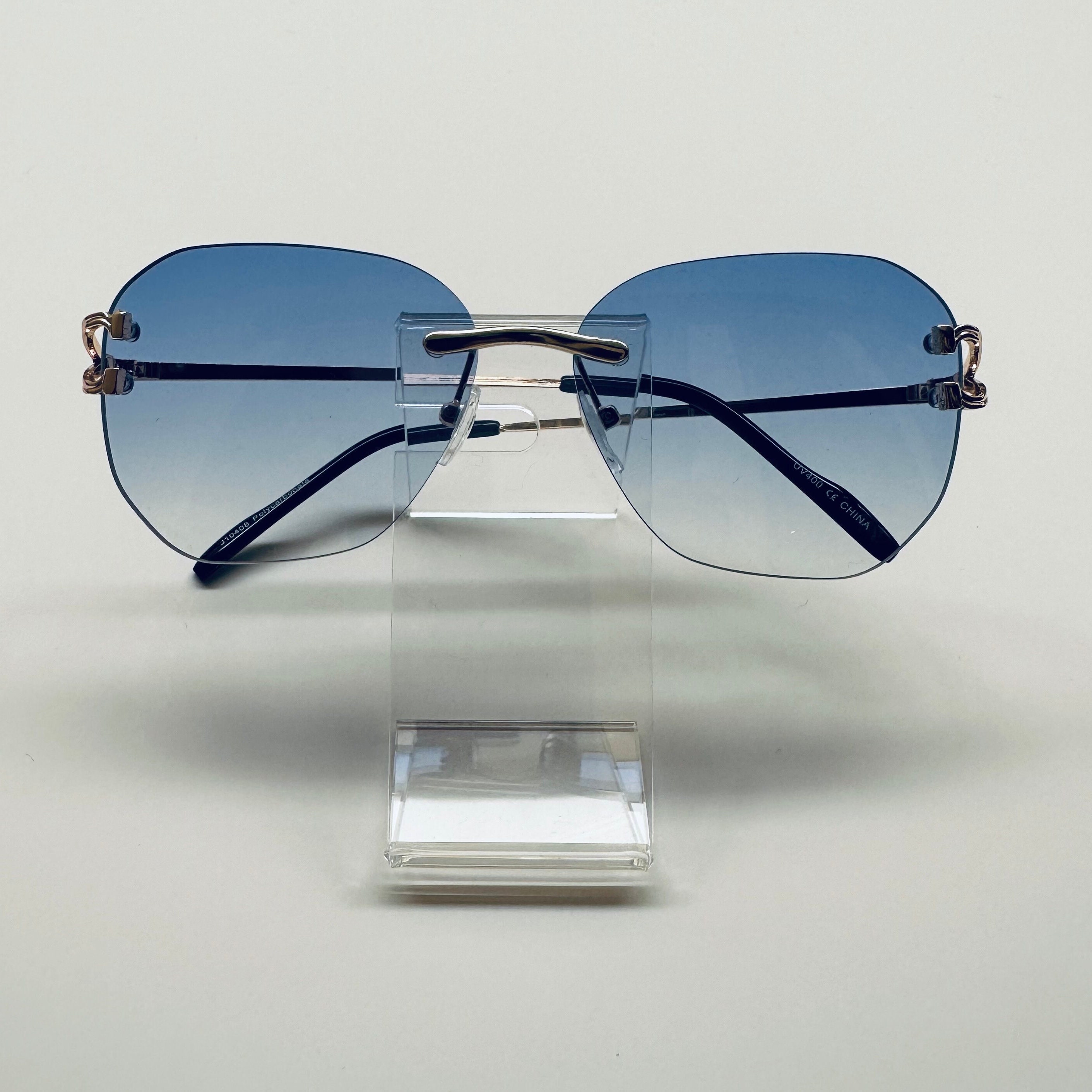 Frameless Light Blue Lens Gold Frame Sunglasses. Unisex Sunglasses ...
