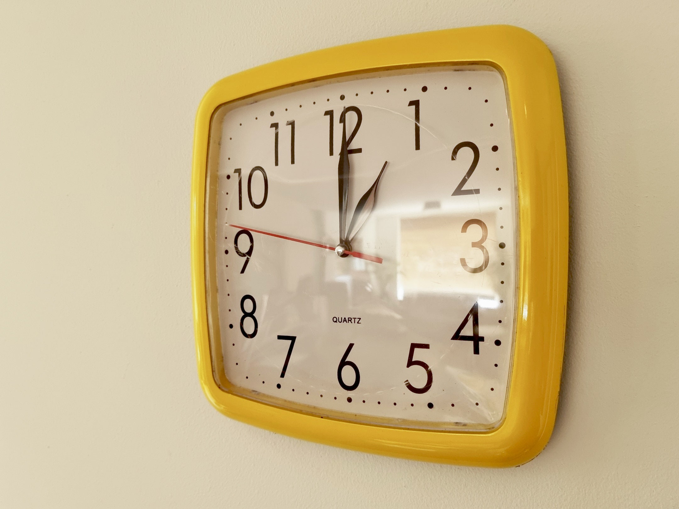Vintage Yellow Plastic Wall Clock - Retro Decor & Styling - China, 1980s.