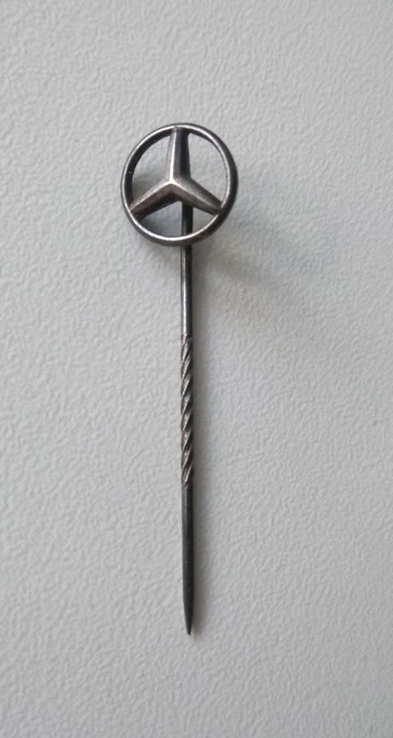 The vintage Mercedes-Benz star lapel pin is a symbol … - Gem