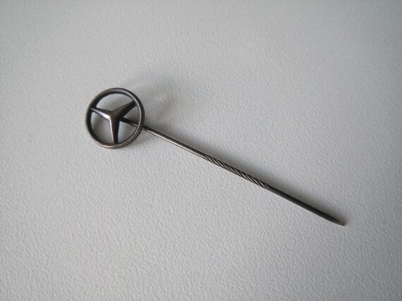 The vintage Mercedes-Benz star lapel pin is a symbol … - Gem
