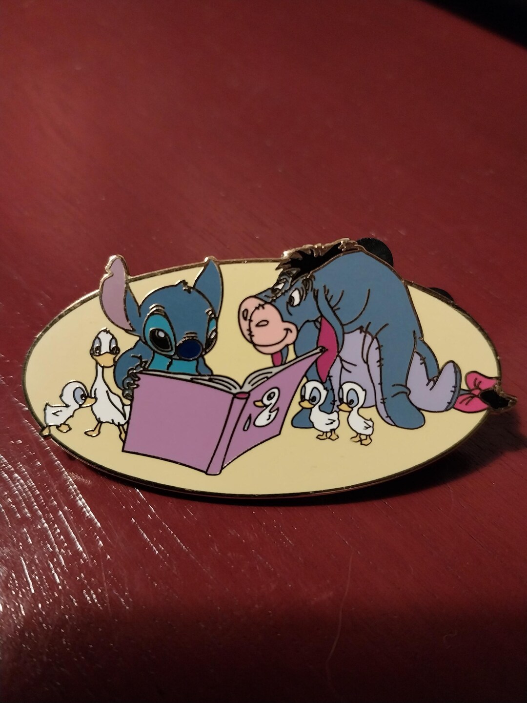 Eeyore and Stitch Disney Pin. Stitch is Reading a Book to Eeyore and ...