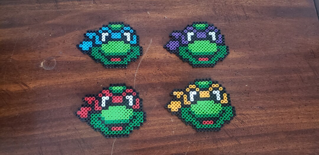 Hero Reptile Heads - Etsy