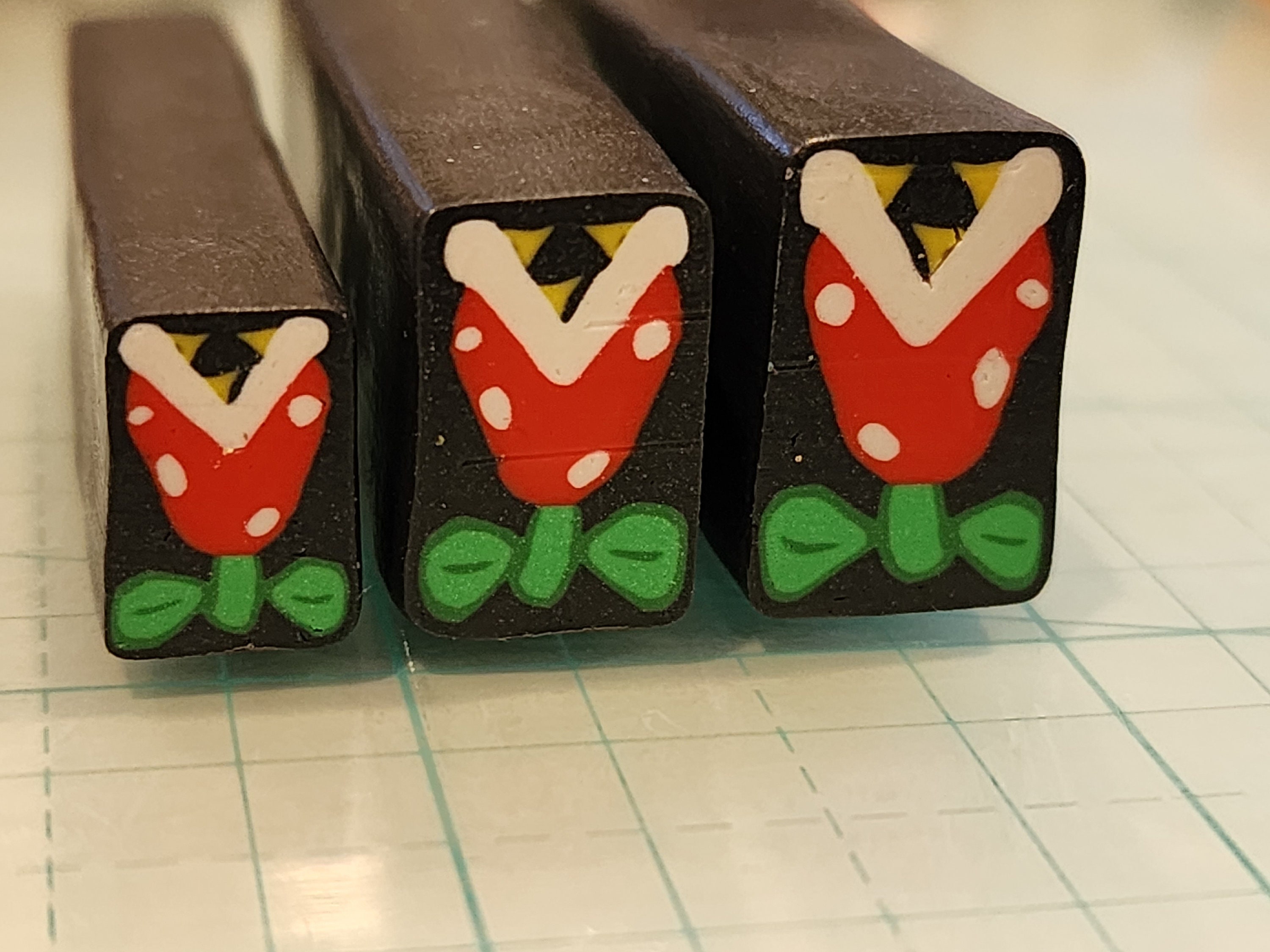 Mario Inspired Plant With Teeth and a Black Background Raw Polymer Clay ...