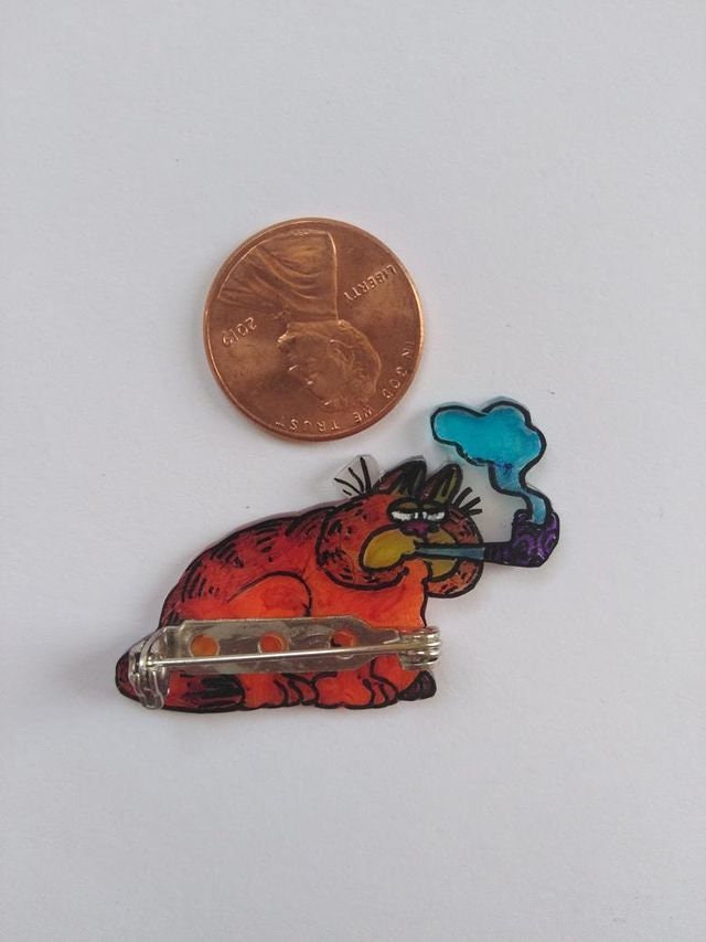Garfield Smoking a Pipe hand-drawn Shrinkydink plastic pin | Etsy