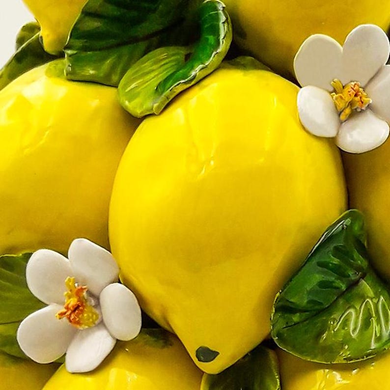 Pyramid Triumph of Lemons With Flowers Raised Standing Centerpiece H ...