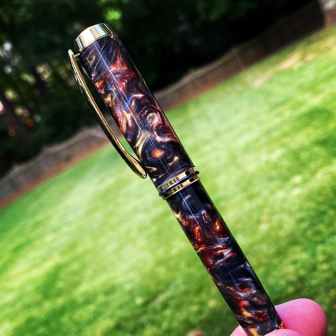 Black and Metallic 3D Orthotope Framed by a Gold Titanium Jr. Gentleman ...