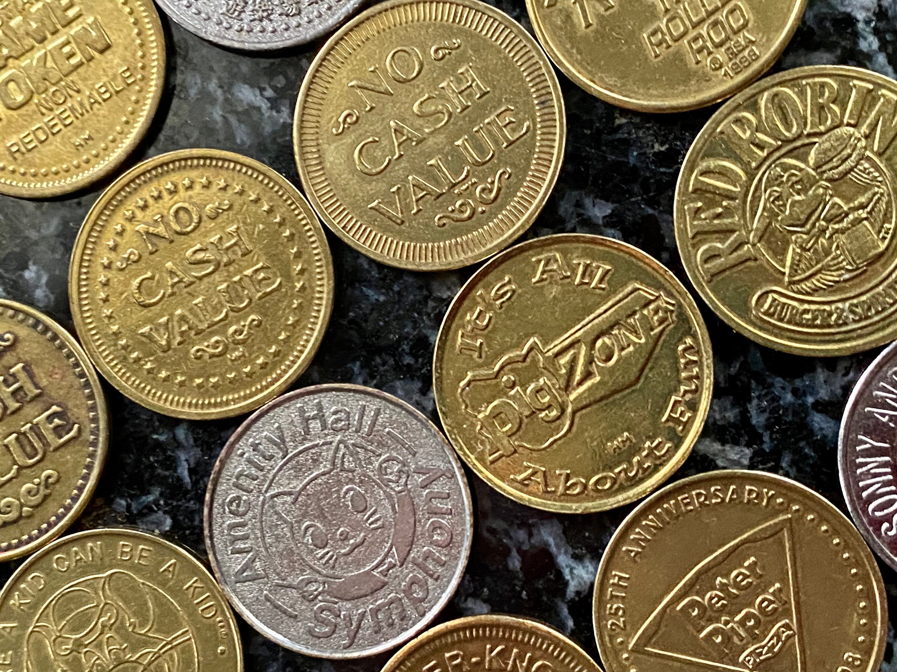 A Collection of 16 Vintage Quarter Size Animated Character Arcade ...