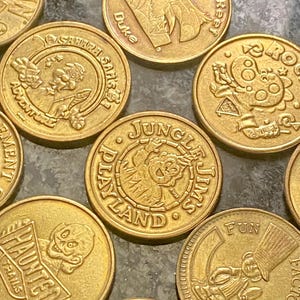 Group of 12 Animated Mascot Classic Arcade Video Game Amusement Tokens ...