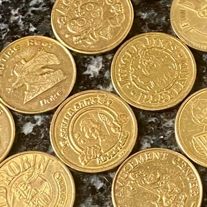 Group of 12 Animated Mascot Classic Arcade Video Game Amusement Tokens ...