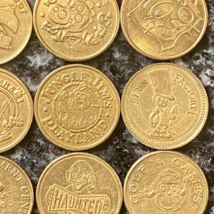 Group of 12 Animated Mascot Classic Arcade Video Game Amusement Tokens ...