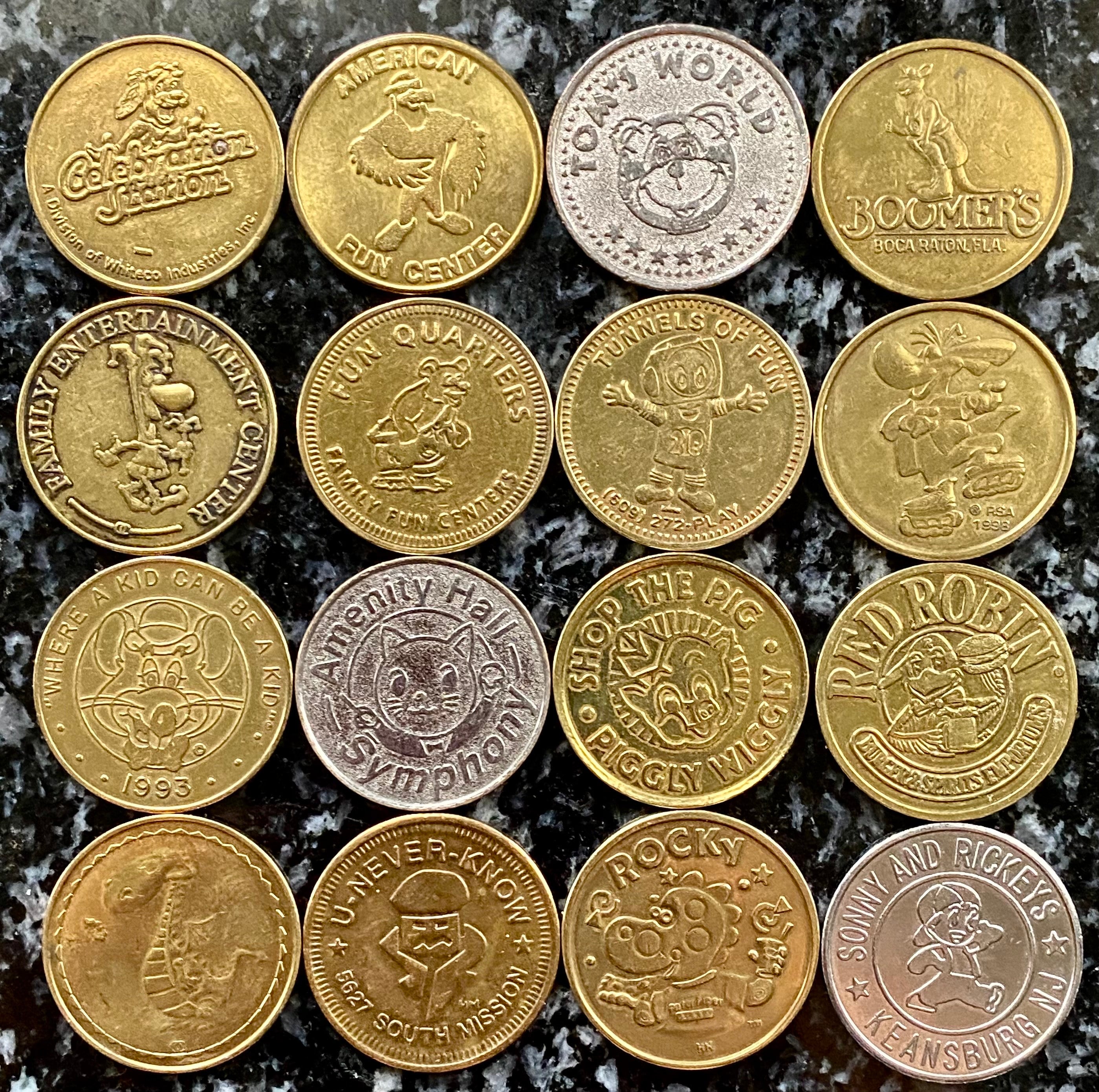 A Collection of 16 Vintage Quarter Size Animated Character Arcade ...