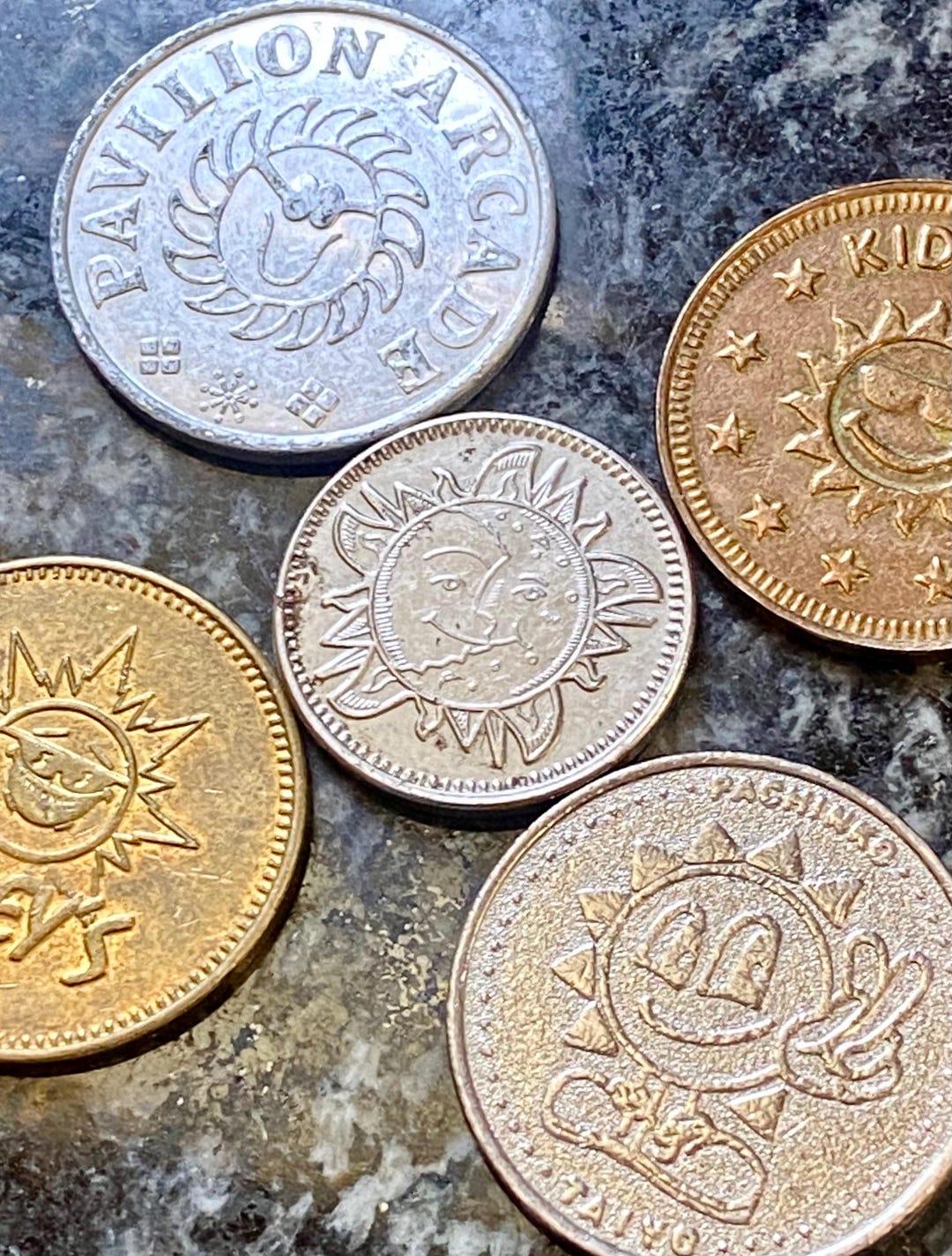A Group of 5 Different Sunburst Theme Coins. Brass & Chrome Sunny Shine ...