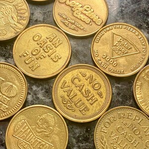 Group of 12 Animated Mascot Classic Arcade Video Game Amusement Tokens ...