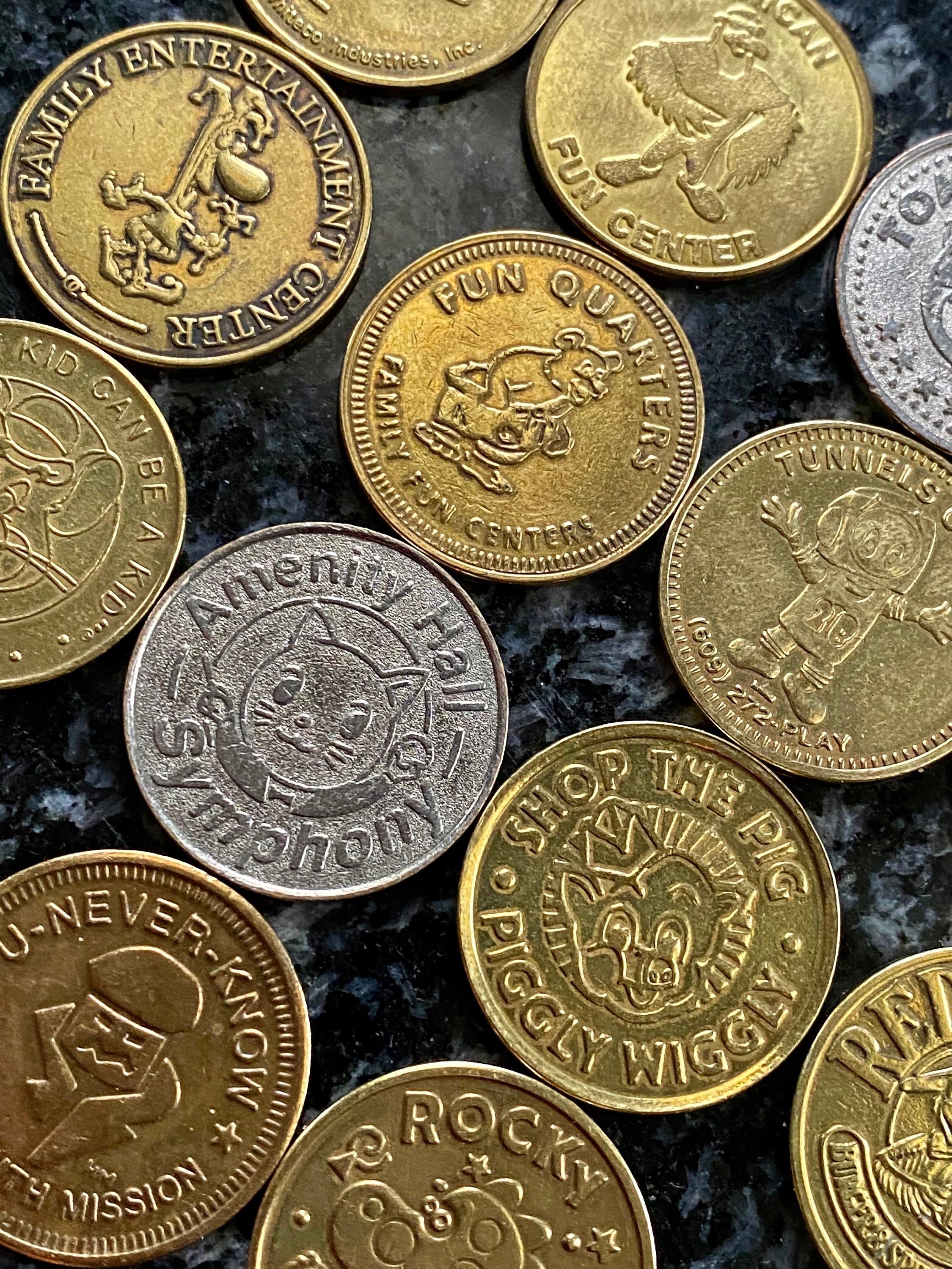 A Collection of 16 Vintage Quarter Size Animated Character Arcade ...