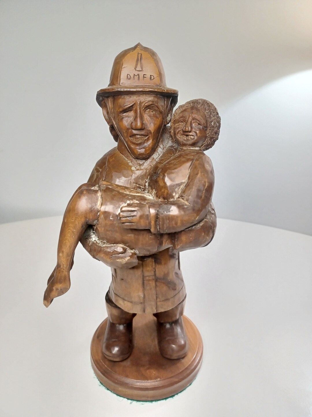 Hand Carved Woodeb Fireman Carrying a Lady, Dated 1984, dmfd on Hat Des ...