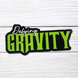Defying Gravity Vinyl Sticker - Waterproof, Elphaba & Glinda Inspired ...