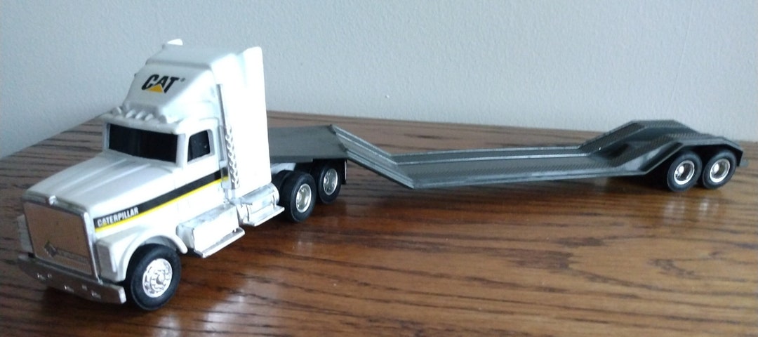 Ertl CAT Die Cast 1-64 - Caterpillar Cab With Trailer - Caterpillar ...