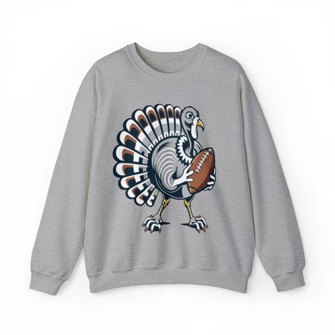 Thanksgiving Turkey Holding Football on Unisex Heavy Blend Crewneck ...