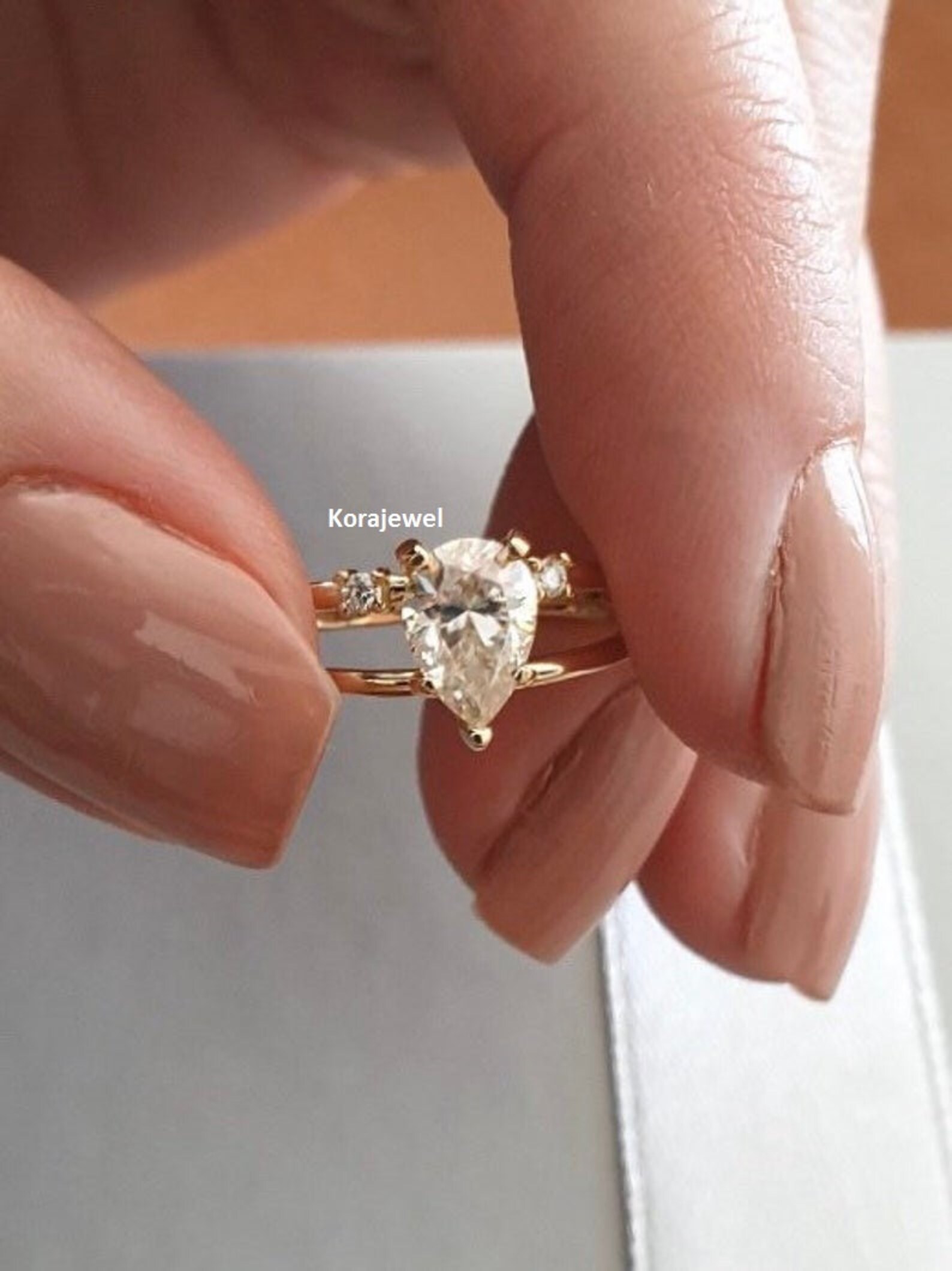 Simple solitaire pear shape engagement rings - coachingoke