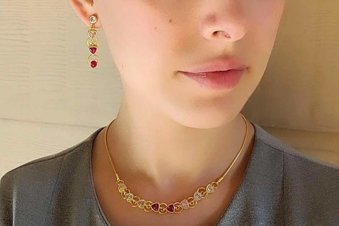 Set of Gold-plated Triangular Links, Joined by Circular Metal Rings ...