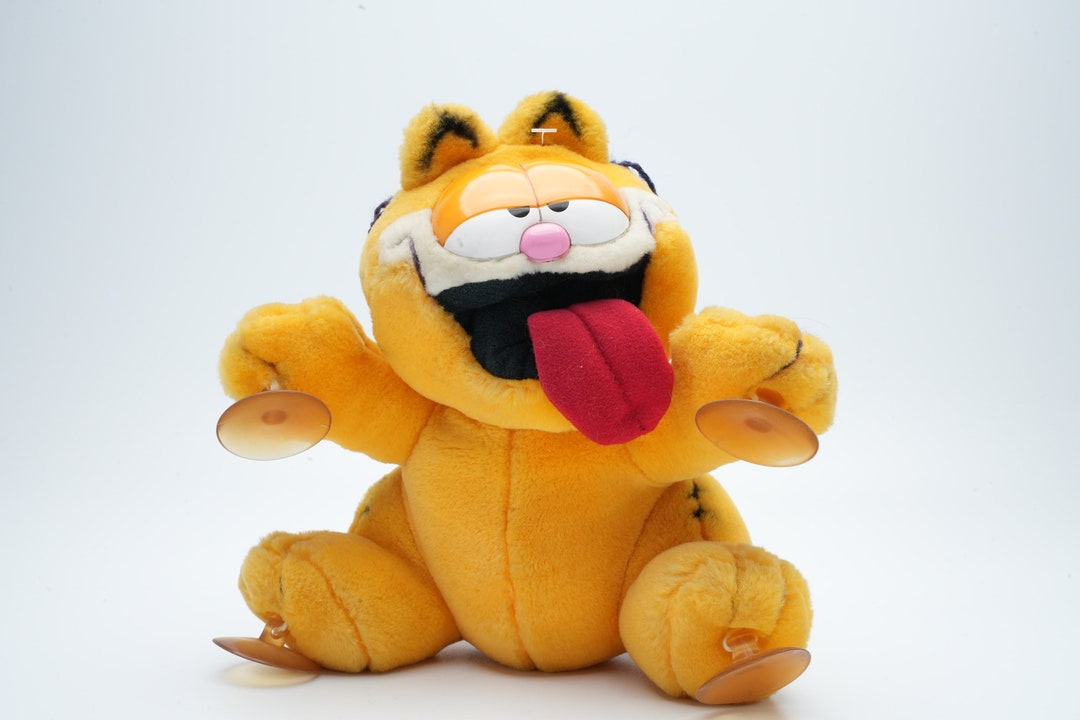 Garfield With His Tongue Out of His Mouth in the Front of the Car Rare ...