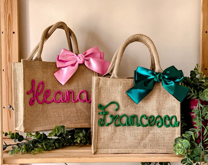 Borsa di stoffa gialla, beige e marrore con grande tasca frontale ...