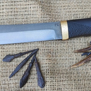The knife is made of Viking arrowheads.Viking knife | Etsy