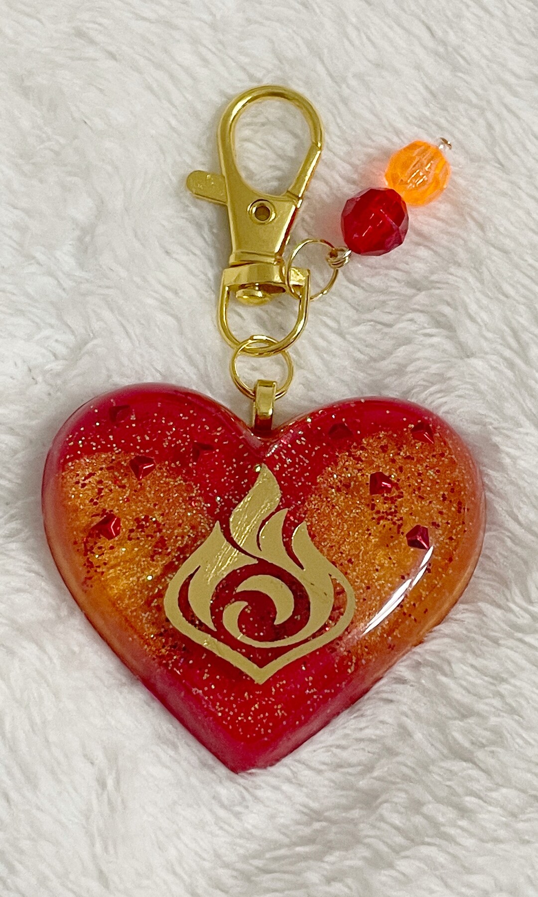 Genshin Impact Pyro Logo Resin Heart Keychain - Etsy