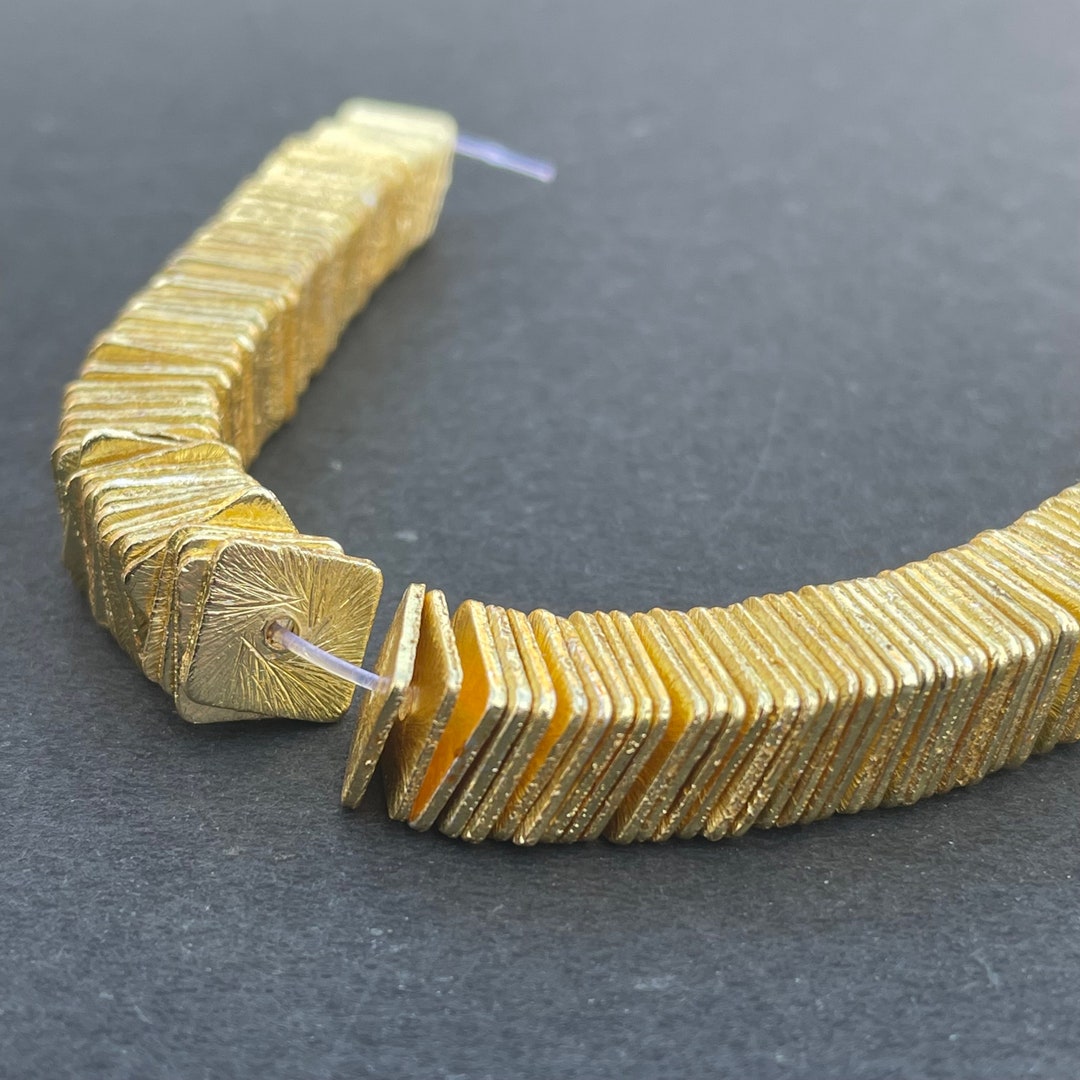 A Strand of Square Disc, Gold Finish ,silver Plated and Gunmetal E ...