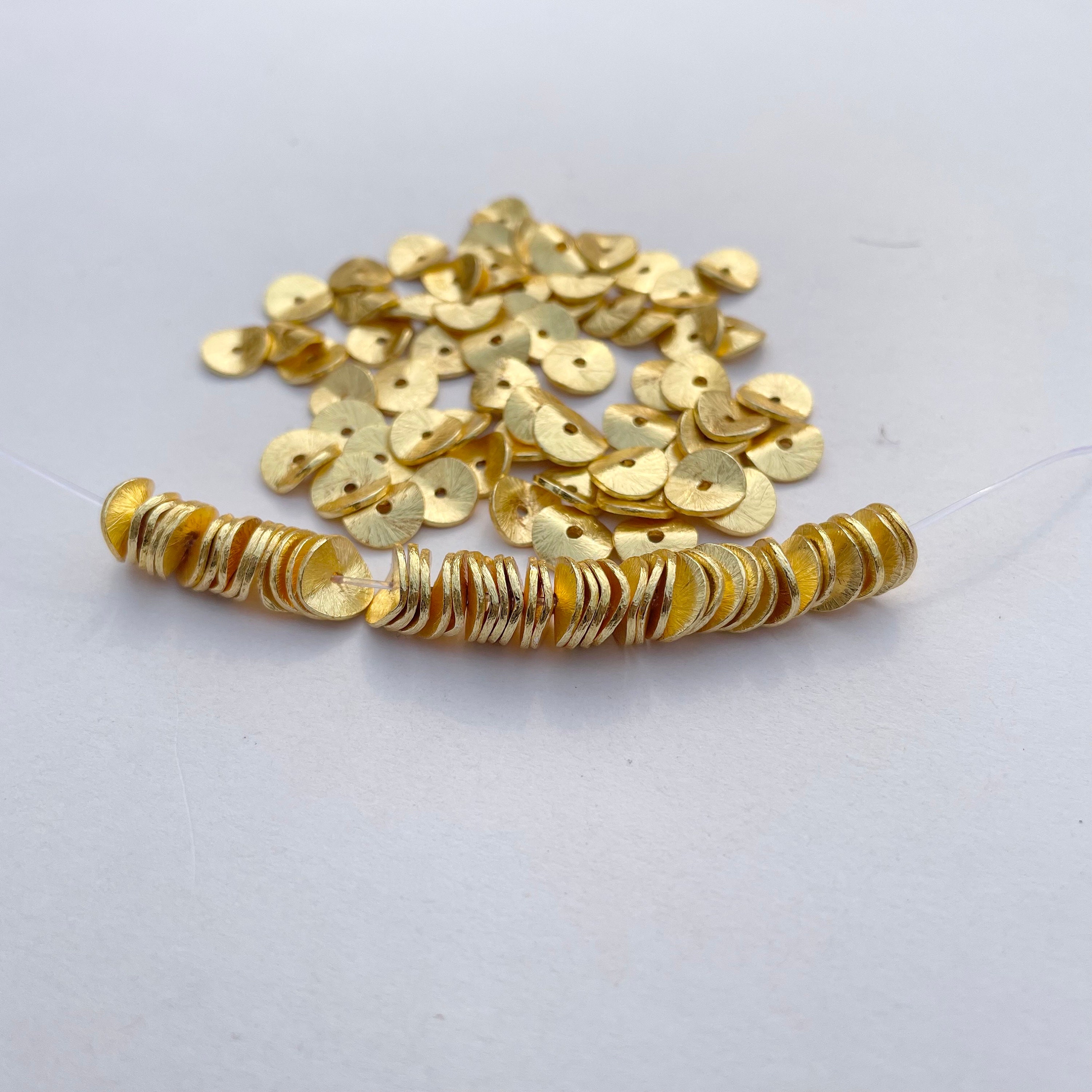 A Strand of Curved Disc , Potato Chips, Wavy Disk, Folding Disk , Gold ...