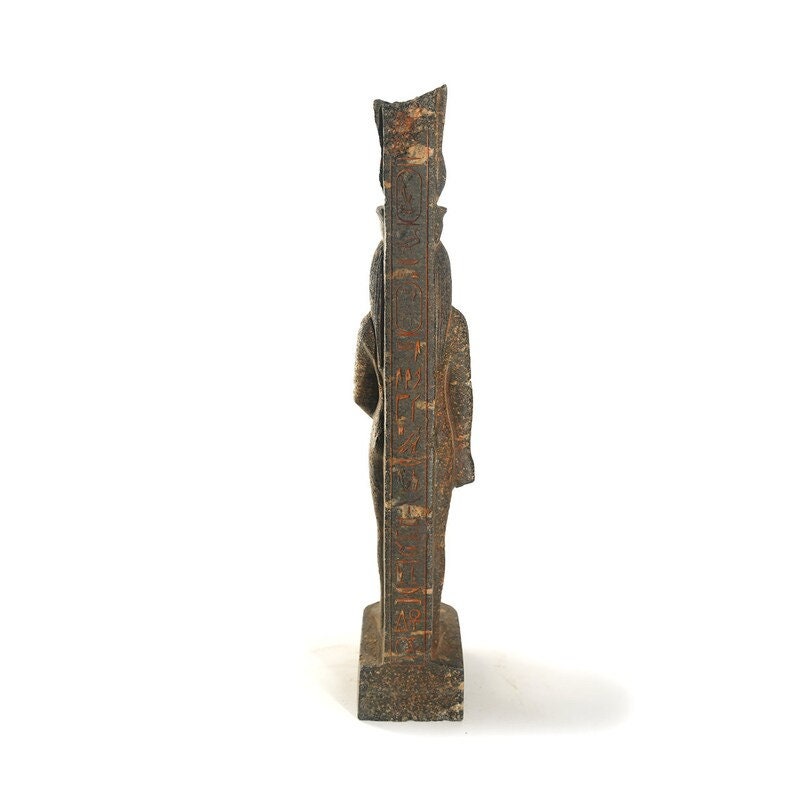 Egyptian Goddess Isis Statue With the Lotus Flower. Egyptian Sculpture ...