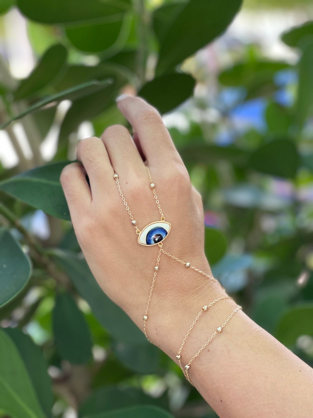 Sophisticated Handmade Evil Eye Hand Chain Bracelet: Symbolic Elegance ...