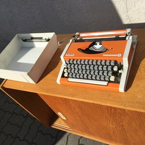 Vintage Orange OLYMPIA Traveler De Luxe Typewriter 70s in Storage Box ...