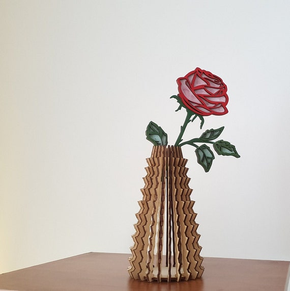 Enkele Roze Roos In Een Vaas