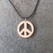 Beautifully Handmade Peace Symbol Pendant Made From Recycled Wood Hung ...
