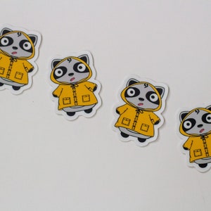 Lindo mapache en la etiqueta engomada del impermeable / etiqueta ...