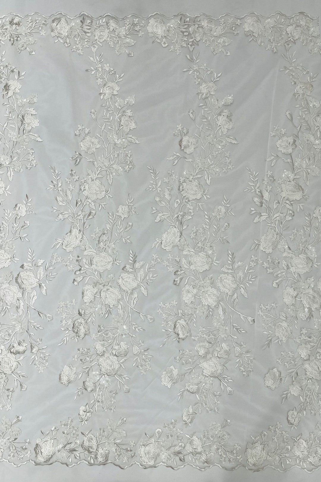 White Floral Design Embroidered With Sequins on a Mesh Lace Fabric ...