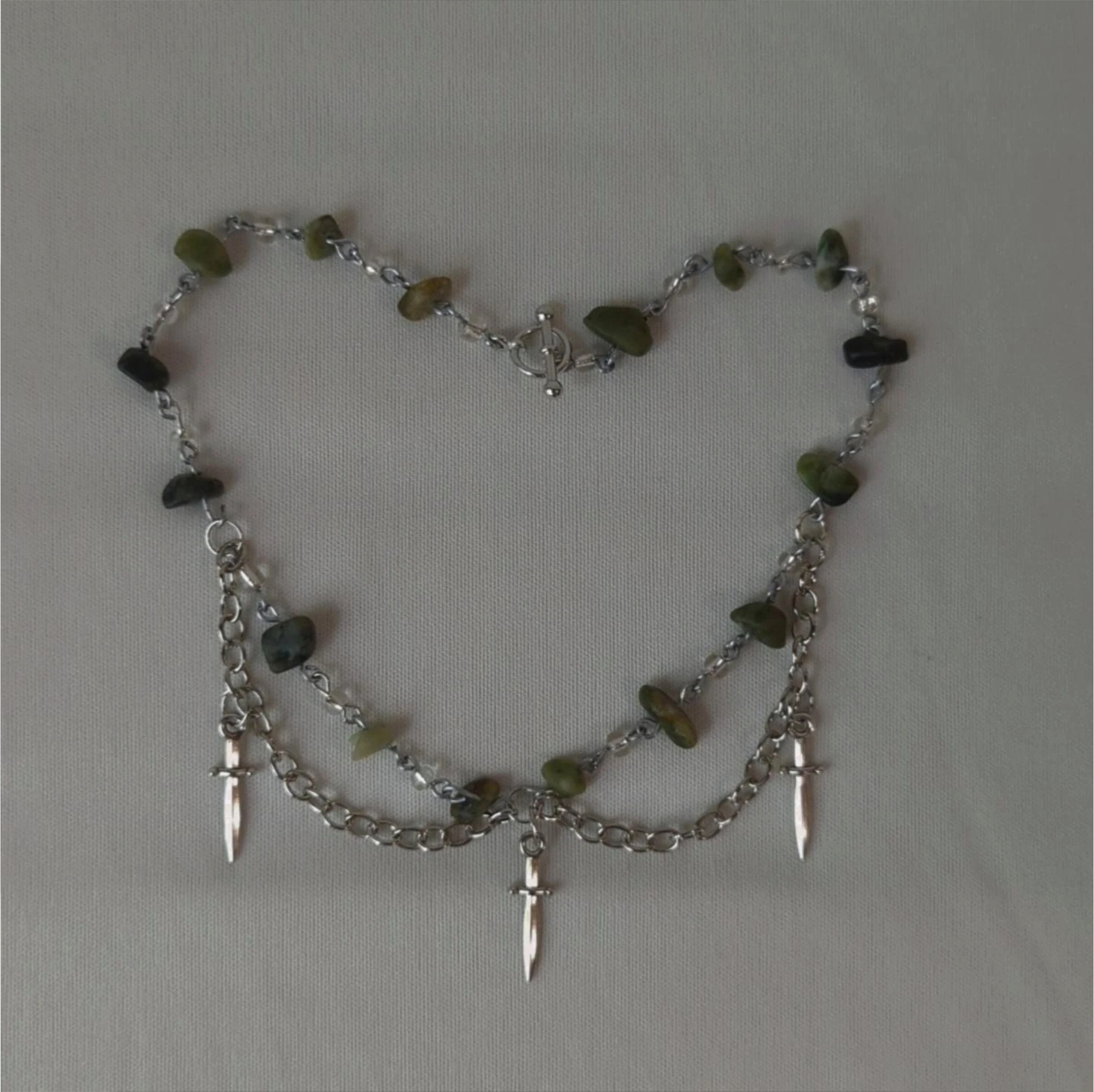 Peter Pan Collection Peter Pan Green Dagger Necklace - Etsy